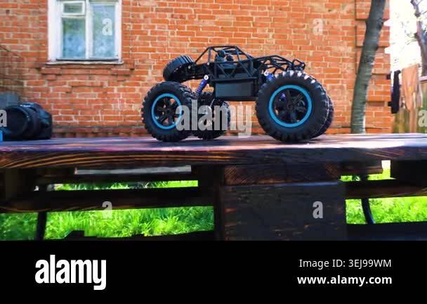 off-road toy cars turn with big tires art creative in water splashes ...