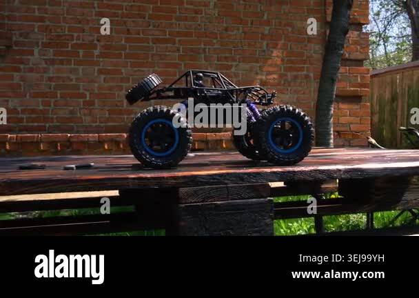 off-road toy cars turn with big tires art creative in water splashes ...