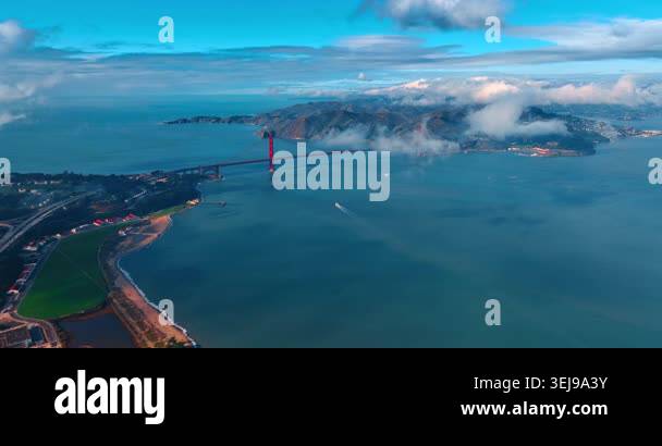 Flying over spectacular blue waterscape of the bay in San Francisco ...