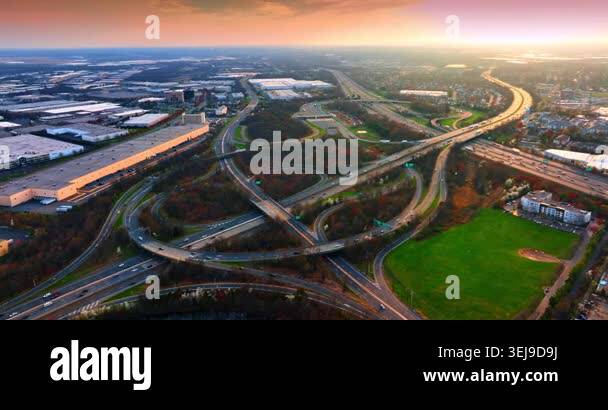 Vast low-rise urban landscape crossed by the system of roads. Lively ...