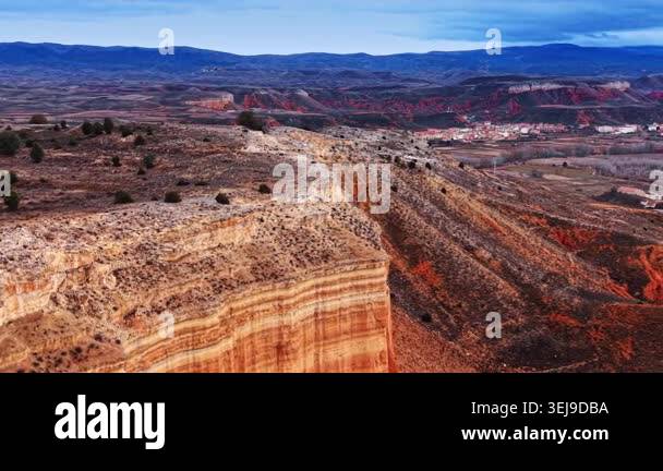 Panoramic view of red clay hills and Spanish village. Aerial landscape ...