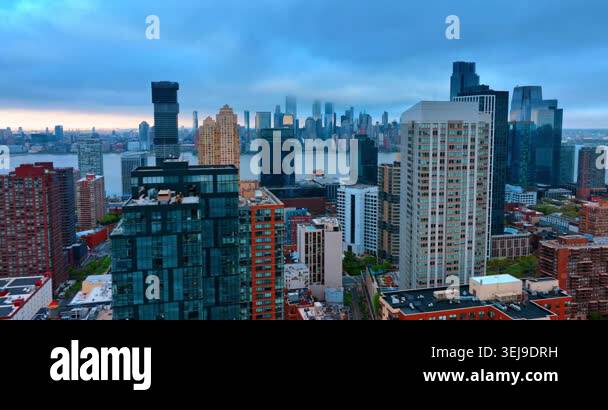 Jersey City High Rises Beside Hudson River Skyline. Overcast aerial of ...
