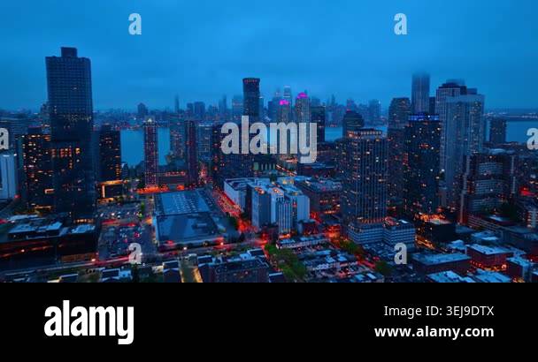 Jersey City, USA, 15 April 2026: Jersey City skyline at blue hour with ...