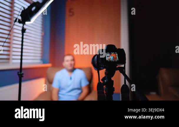 Professional medic speaks to camera in the light of soffit. Creating a ...
