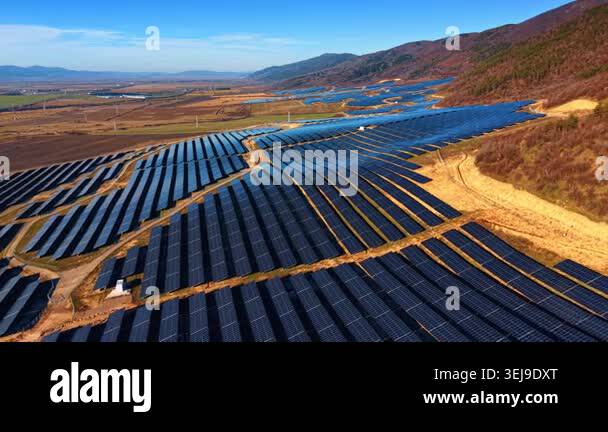 Footage over the multiple solar panels in the wilderness. Renewable ...