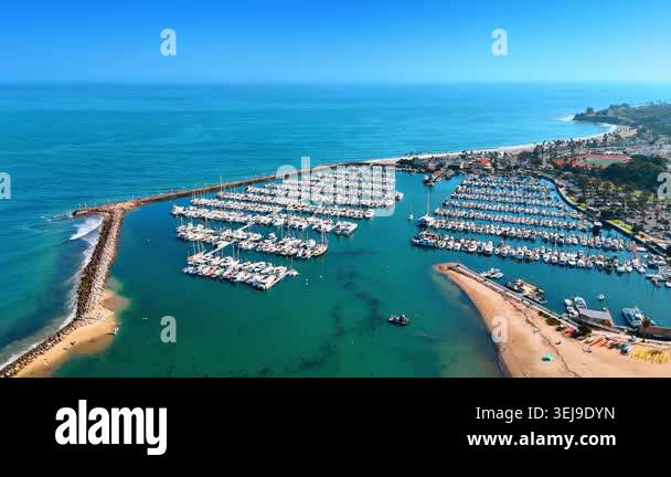 Santa Barbara Yacht club with numerous vessels. Approaching the harbor ...