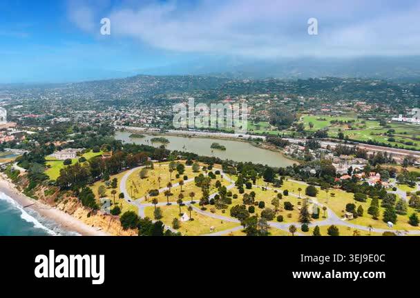 Vast golf courses with green trees. Aerial perspective on Andree Clark ...