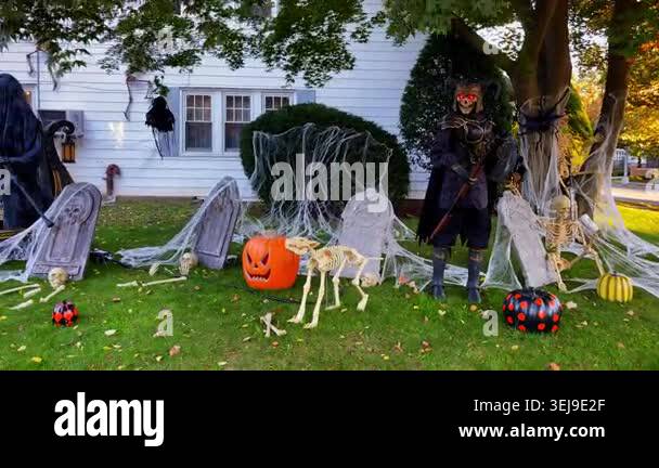 Lawn decorated with diverse scary figures and statues for Halloween ...