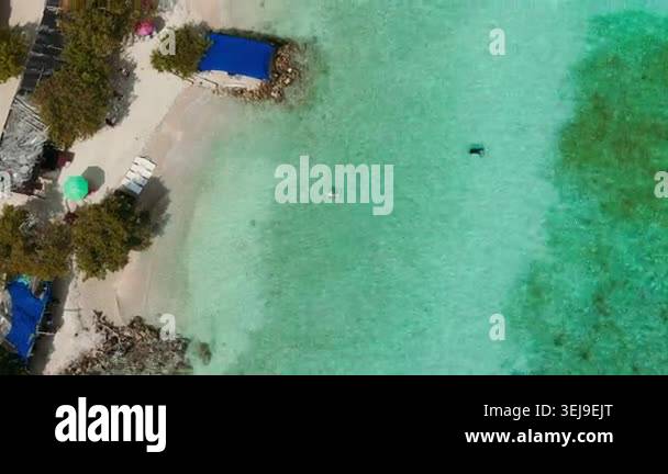 Aerial drone shot of tropical beach with turquoise water on isla mucura ...