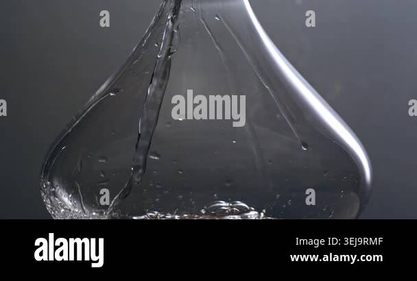 Water Drops Falling Into Transparent Liquid Macro Close Up Slow Motion ...