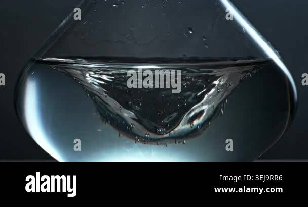 Abstract Water Wave Flowing Inside Glass Shape Macro Close Up Slow ...