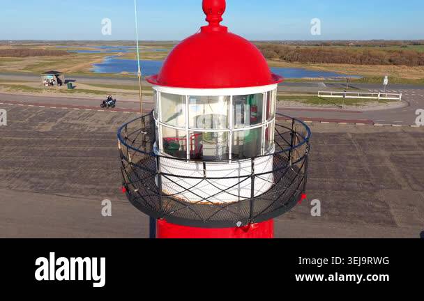An aerial drone shot highlights the red dome, glass windows, and ...