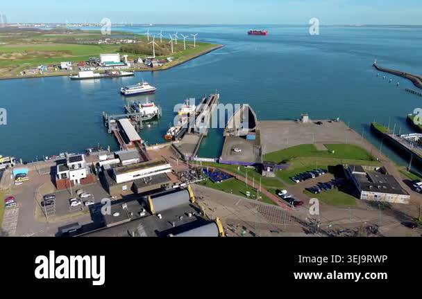 An aerial drone perspective captures the bustling port terminal in ...