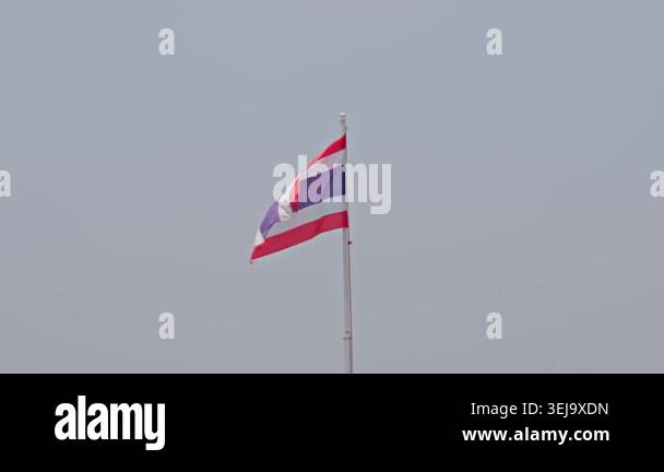 Thailand National Flag Waving On Flagpole Against Clear Sky, Patriotic ...