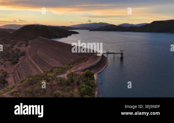 Aerial video capturing a colourful sunset over Glenbawn Dam in the ...