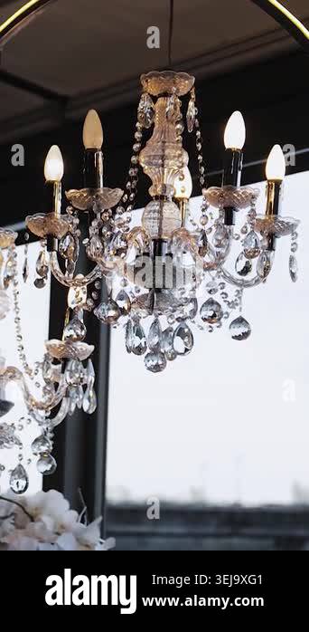 Vertical video. Wedding ceremony hanging outdoor chandelier for ...