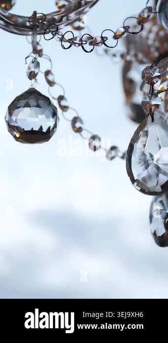 Vertical video. Macro shot showing part of wedding chandelier with ...