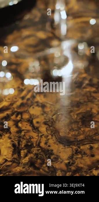 Vertical video. Dark marble surface with natural stone patterns and ...