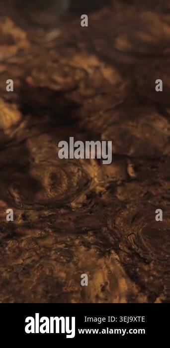 Vertical video. Close-up of polished dark marble with stone patterns ...