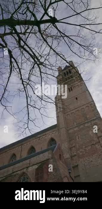 Low angle view of the impressive brick gothic architecture of Saint ...
