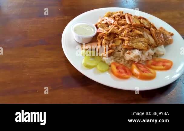 Juicy chicken shawarma plate with rice kebab tzatziki served in ...