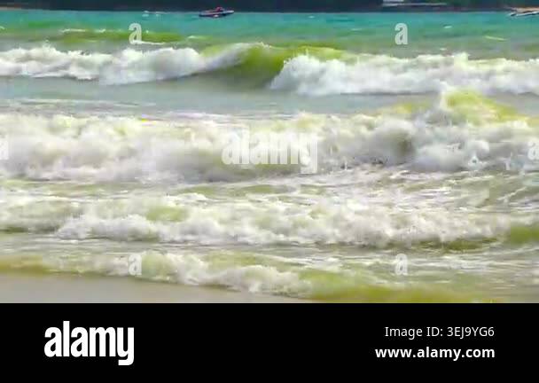 Beautiful tropical shoreline with powerful waves, clean sand and ...