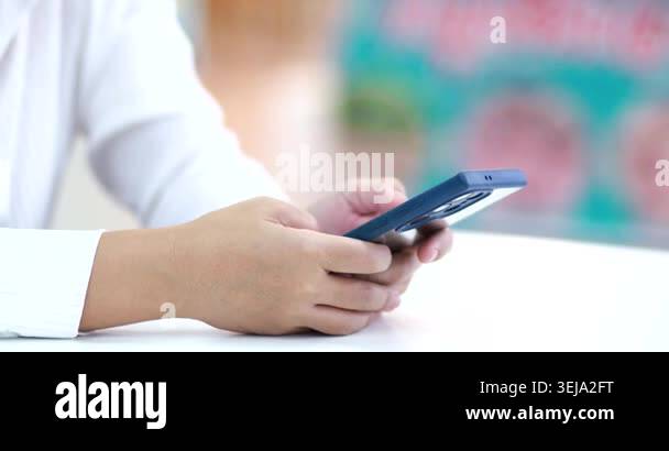 Hands using a smartphone in everyday life, representing communication ...