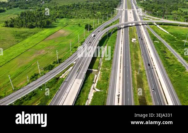 Aerial view of modern highway interchange with multilayer roads and ...