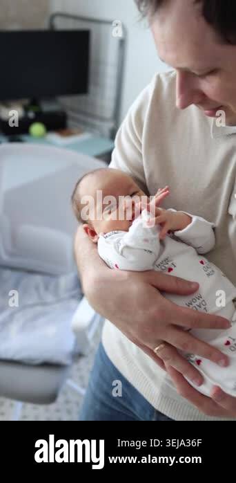 Infant soothing scene. Warm tones, clean background for parenting and ...