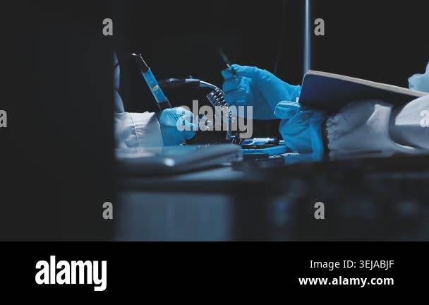scientist working at the laboratory with a microscope Stock Video ...