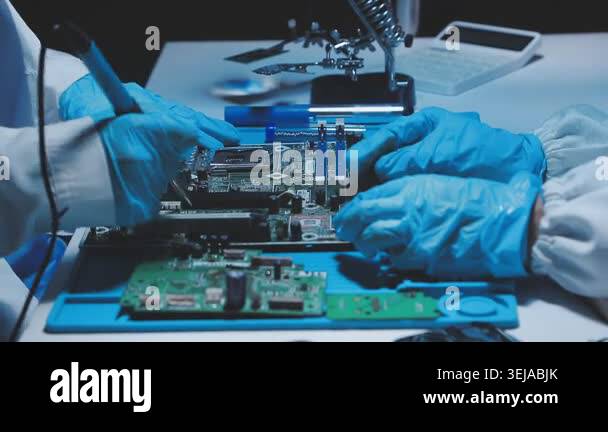 technician repairing computer circuit board, close up Stock Video ...