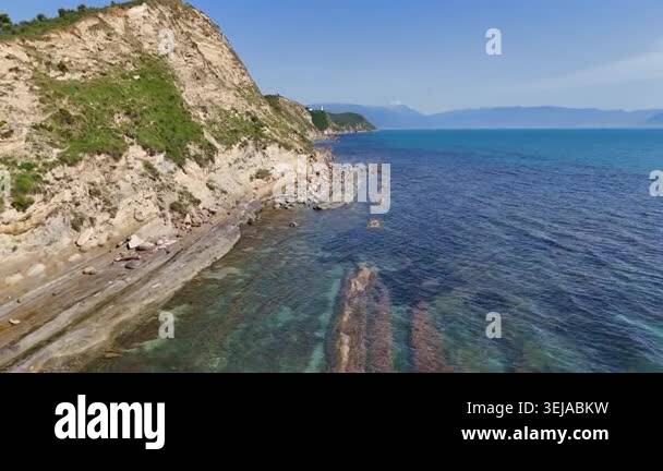 Aerial drone footage of a remote Mediterranean beach in Albania with ...