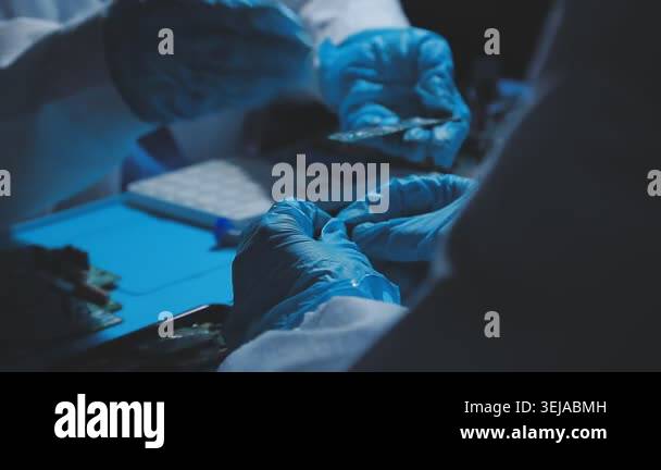 close up of scientist using laptop computer in laboratory. scientist ...