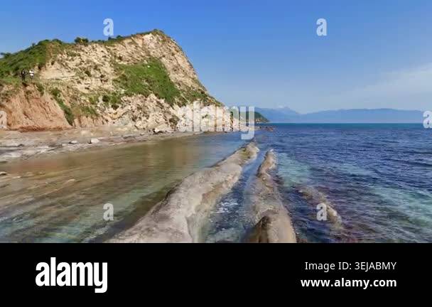 Travel and tourism aerial footage showing remote coastal scenery, blue ...