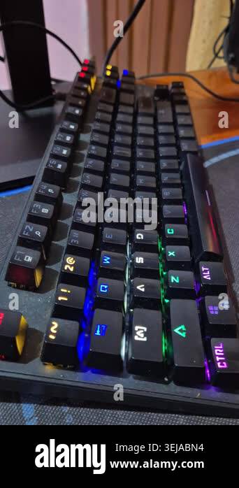 Side view of a mechanical gaming keyboard with colorful RGB LED backlit ...