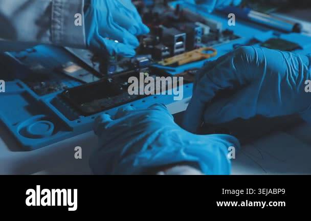 close up of hands of professional technician in uniform holding ...