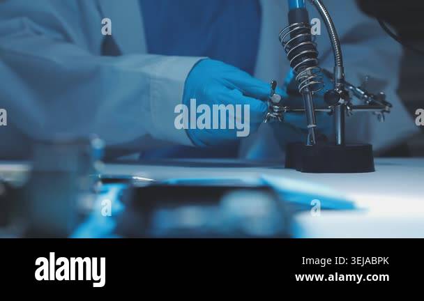 laboratory assistant working with microscope Stock Video Footage - Alamy