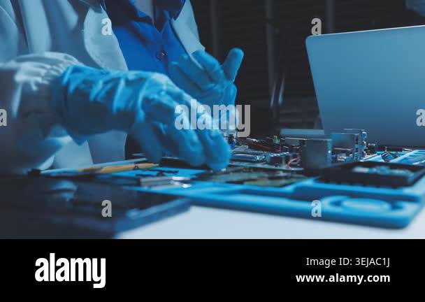 computer repair. close up. man repairing laptop in the workshop Stock ...