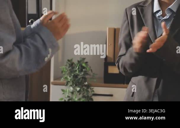 businessmen shaking their hands Stock Video Footage - Alamy