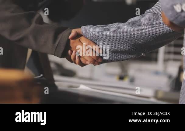business people shaking hands Stock Video Footage - Alamy