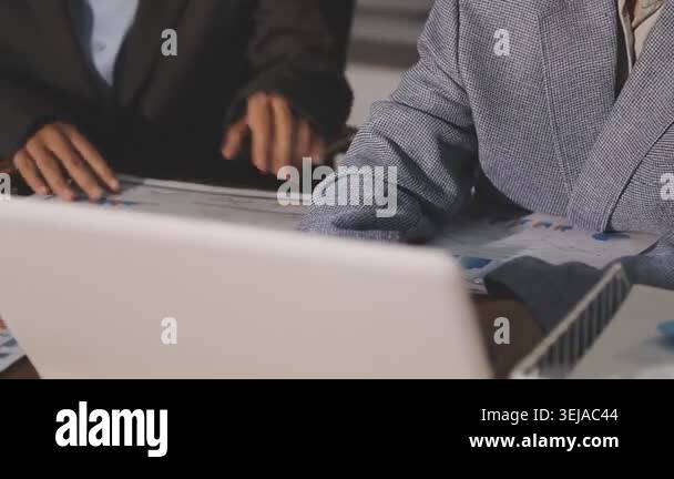 business colleagues working together at desk Stock Video Footage - Alamy