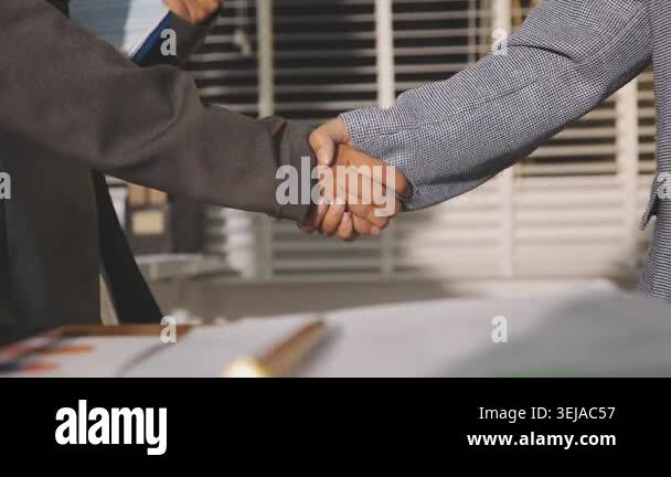 business team shaking hands in office Stock Video Footage - Alamy