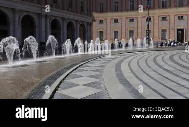 Fountain water jets splashing at Piazza De Ferrari in Genoa Italy ...