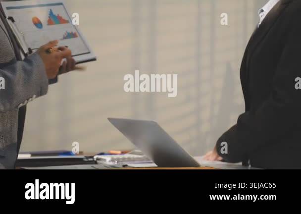 business team working on laptop Stock Video Footage - Alamy