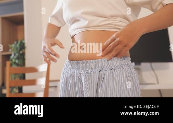 young woman suffering back pain, back pain, back pain concept of health ...