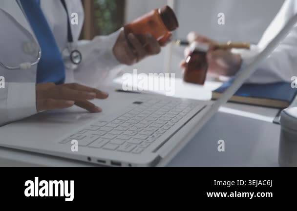 doctor holding a medical prescription in a laptop Stock Video Footage ...