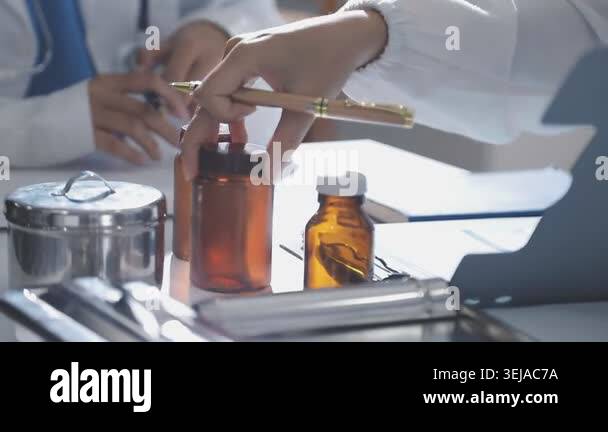 doctor holding medical syringe in his hand Stock Video Footage - Alamy