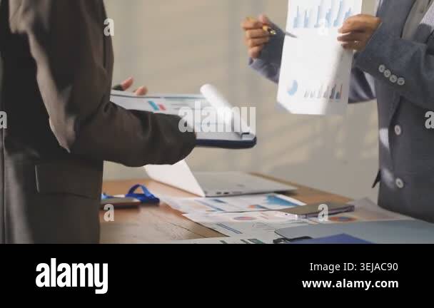 close up of businessman shaking hands in office Stock Video Footage - Alamy