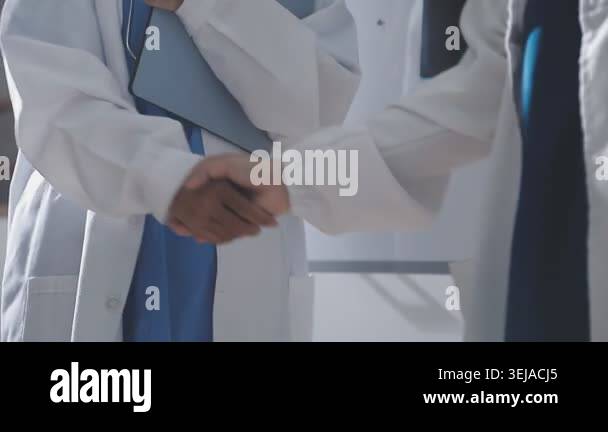 doctor shaking hands with a patient Stock Video Footage - Alamy