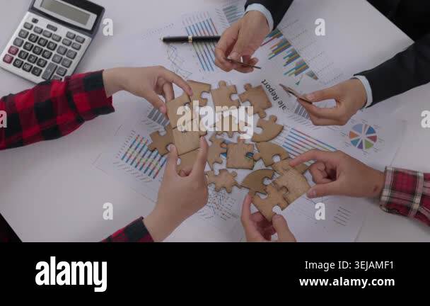 Top view close up shot of professional successful group of Hand holding ...